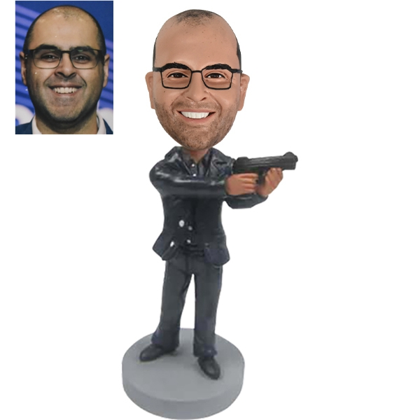 Cool bobble head doll holding gunCustom Bobbleheads| Personalized ...